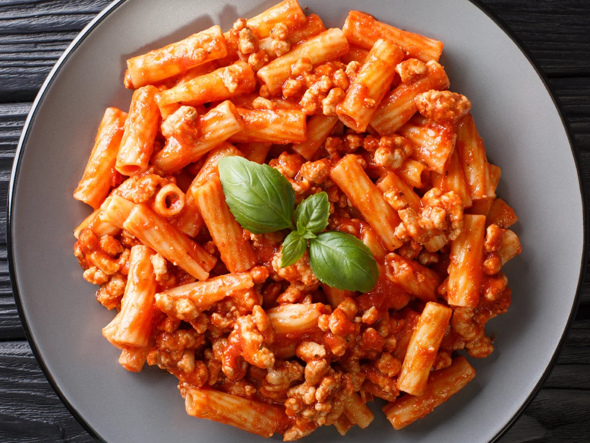 Mezzi rigatoni with sausage, stracchino cheese and saffron – TVS Pentole
